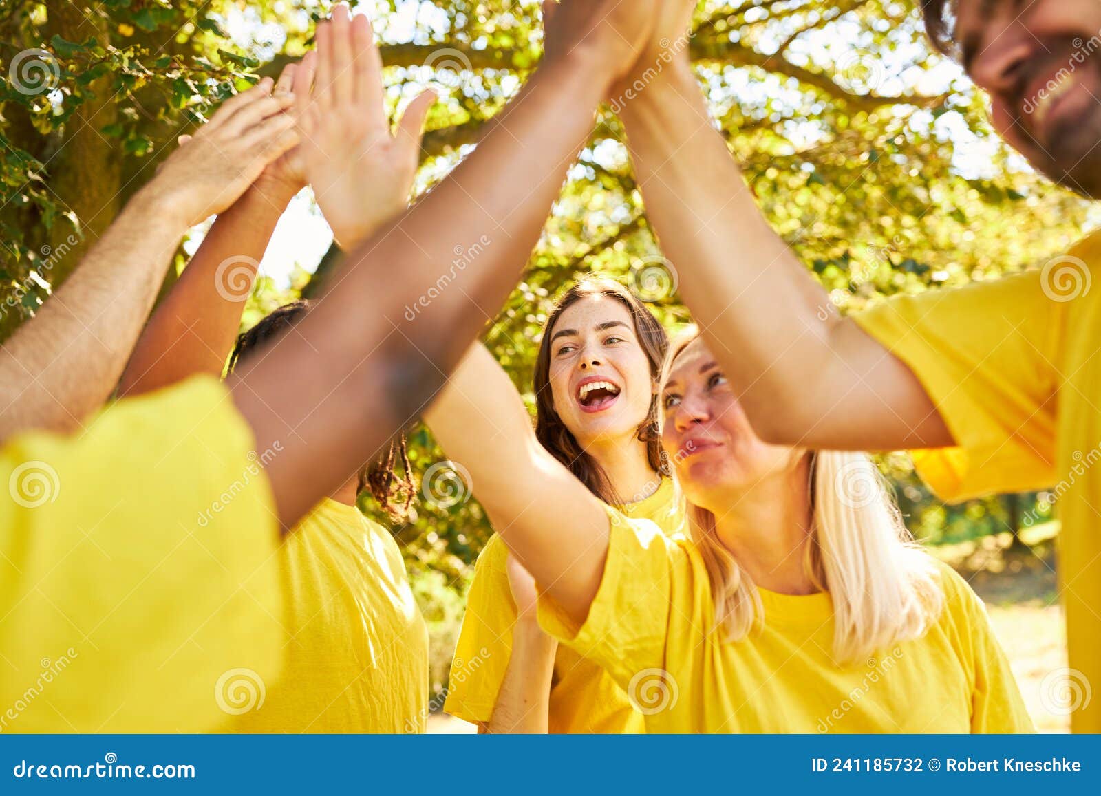 A Team As a Group Makes High Five a Motivation Stock Photo - Image of ...