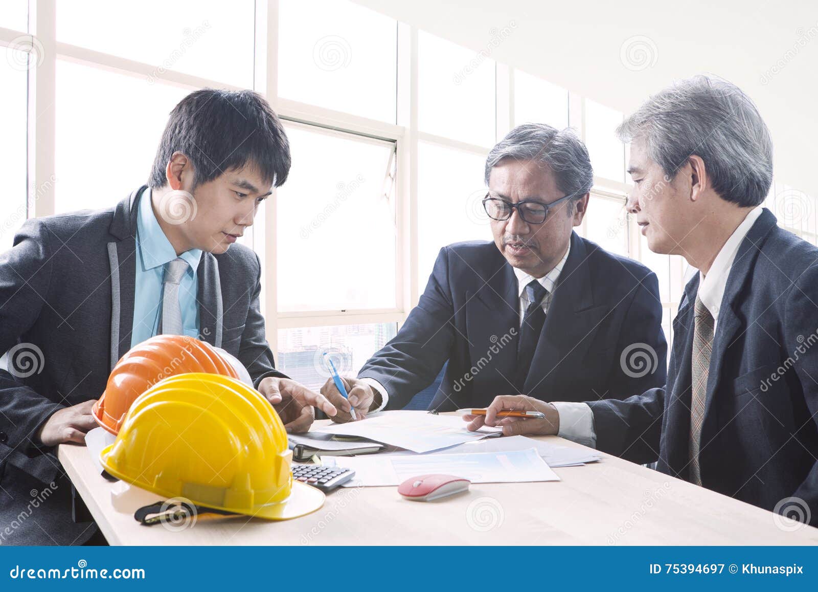 Team of Asian Engineering Man Project Solution Discussing in Off Stock ...