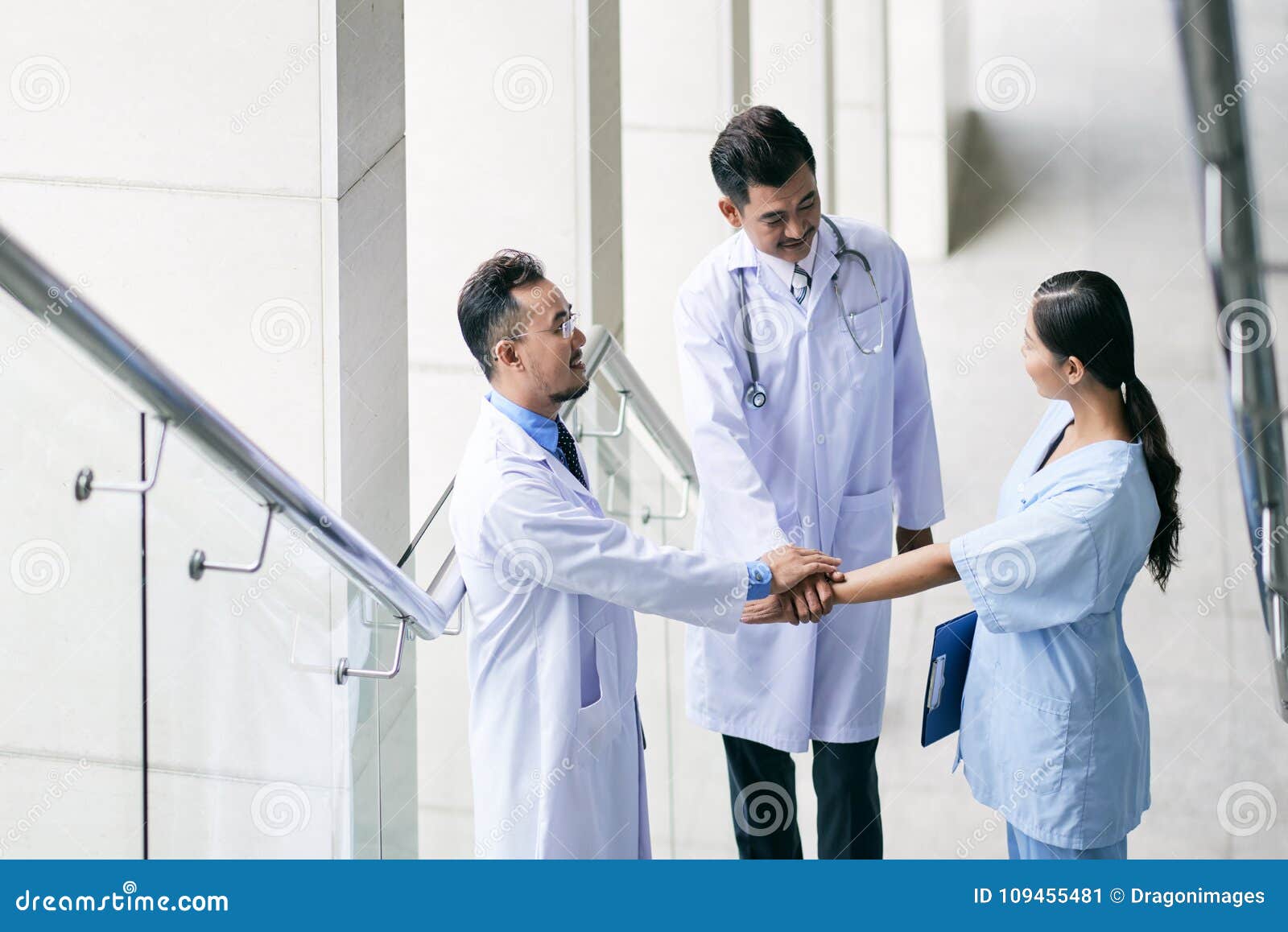 Supportive colleagues stock image. Image of vietnamese - 109455481