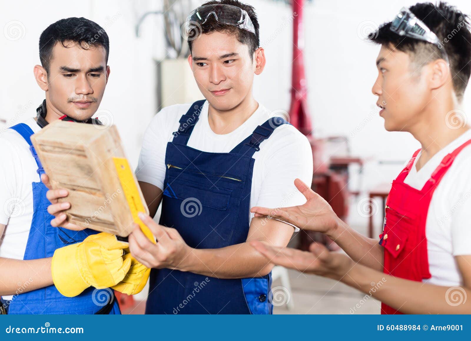 Team of Asian Workers Discussing Product Stock Photo - Image of working ...