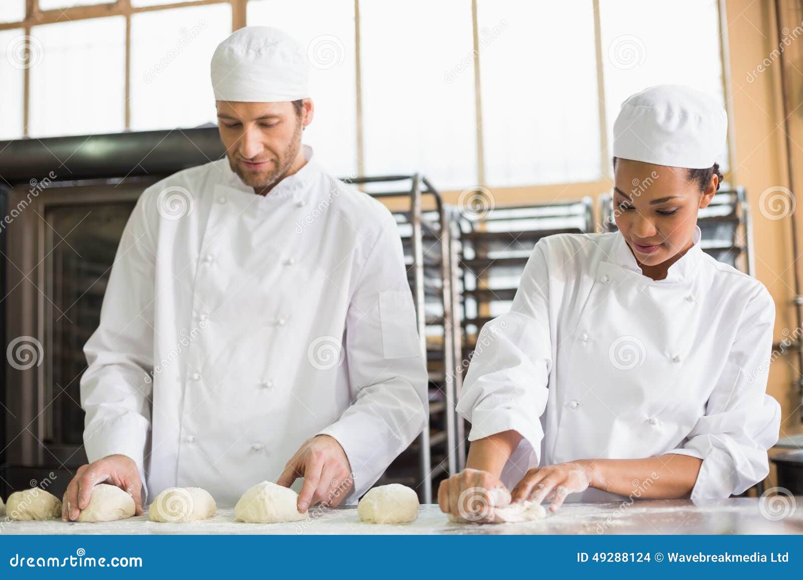 Team of Bakers Preparing Dough Stock Photo - Image of making ...