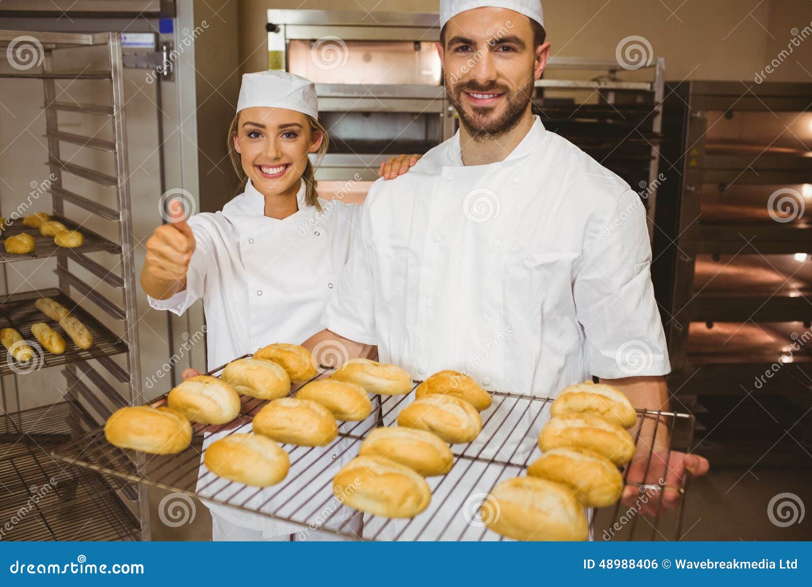 Team of Bakers Smiling at Camera Stock Photo - Image of looking, school ...