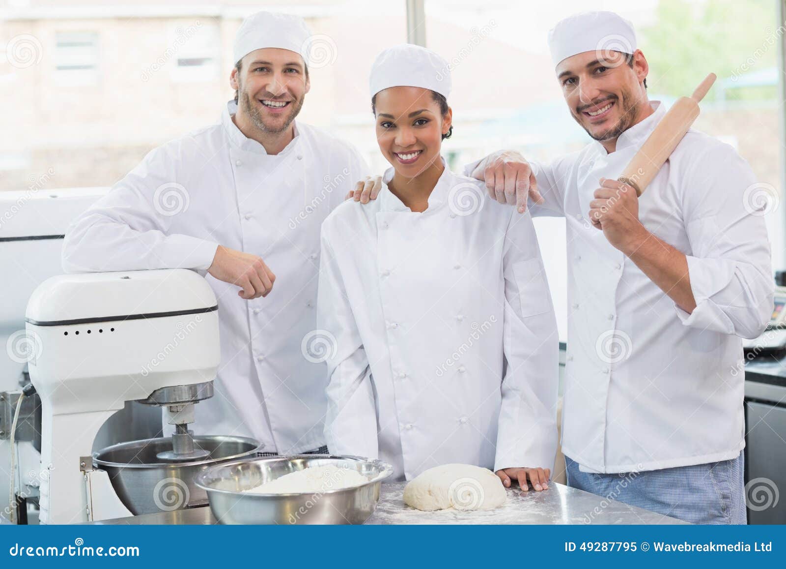 Team of Bakers Smiling at Camera Stock Image - Image of chefs, baker ...