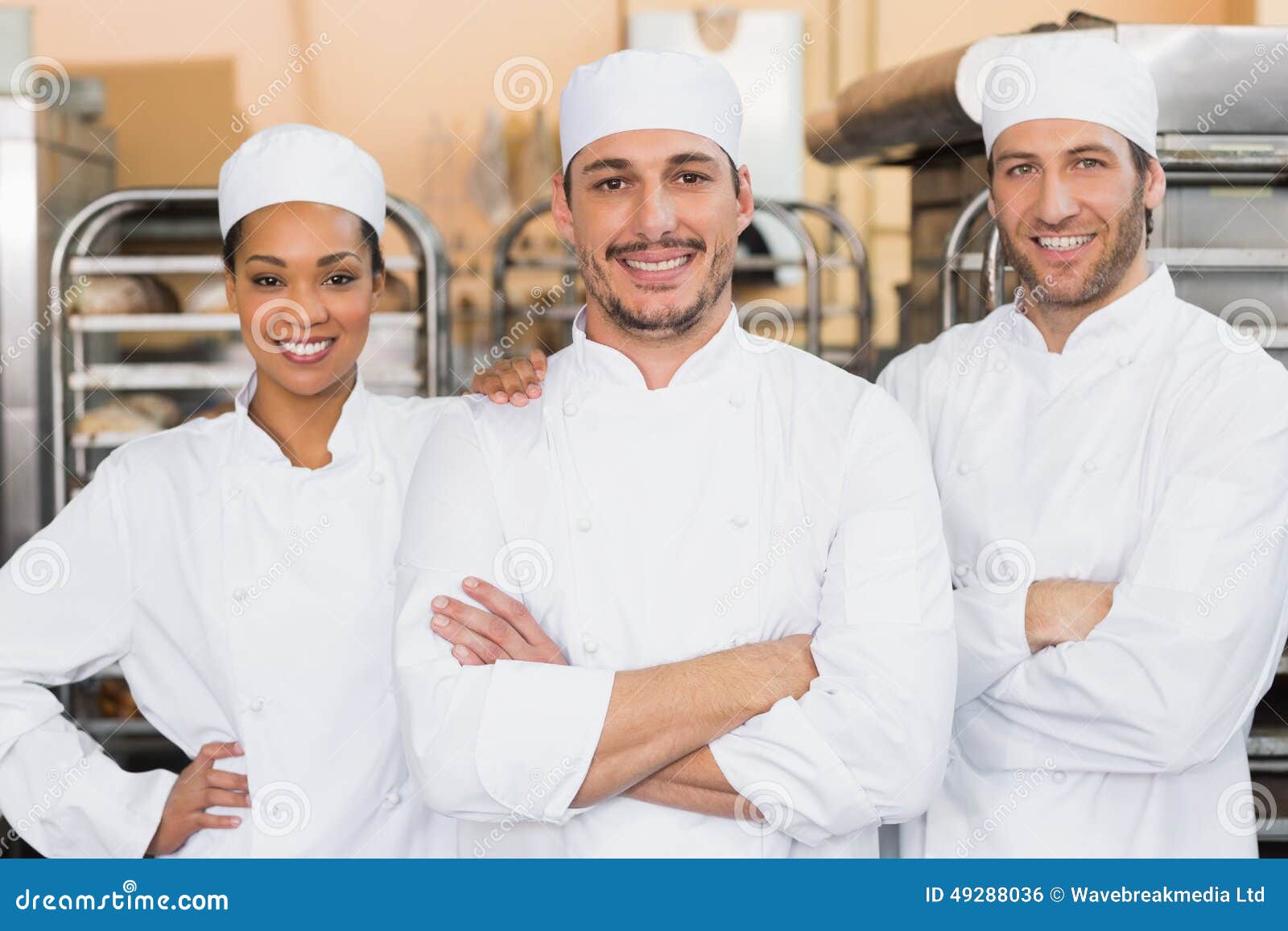 Team of Bakers Smiling at Camera Stock Photo - Image of commercial ...