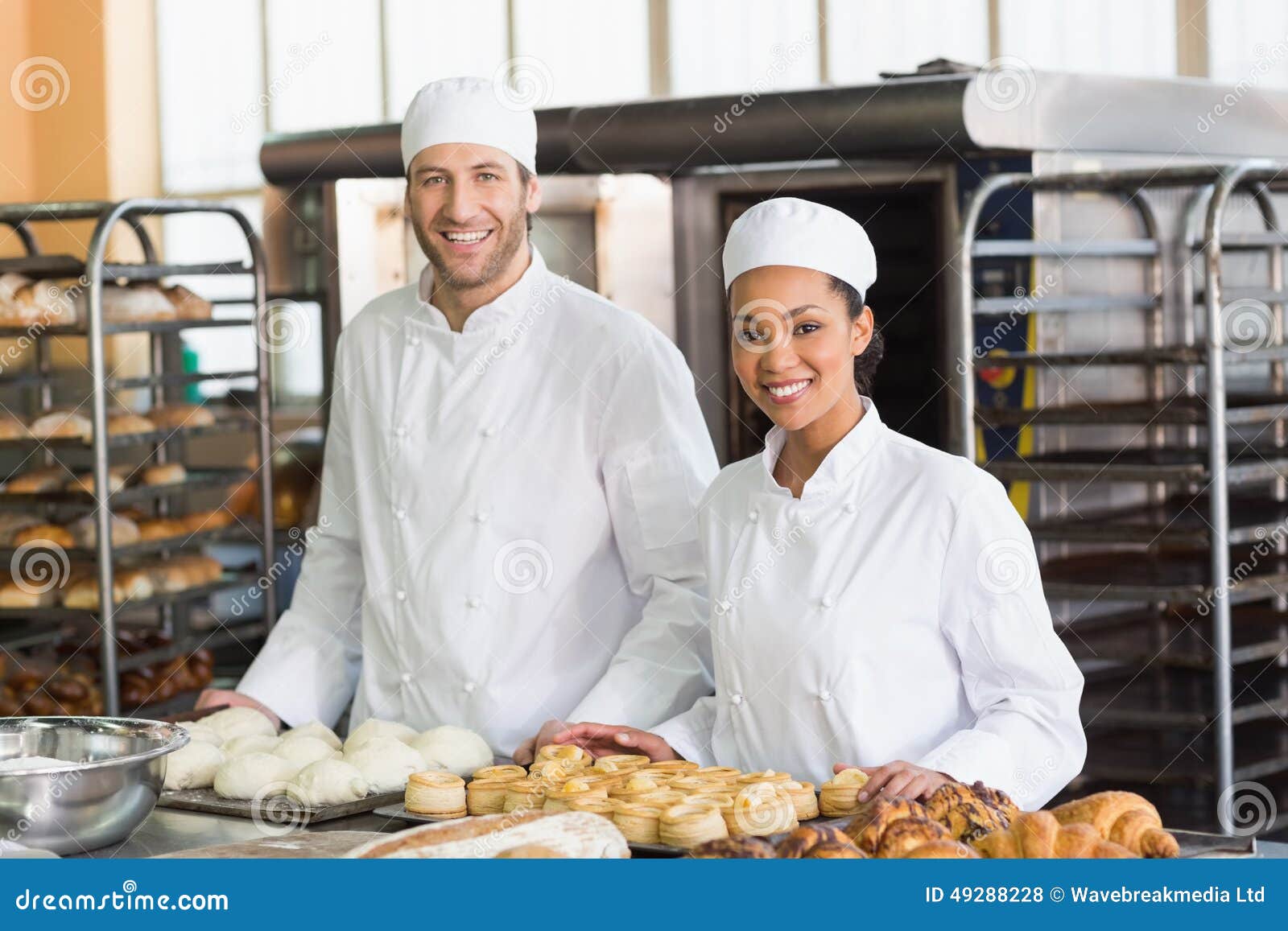 Team of Bakers Smiling at Camera Stock Photo - Image of happy, cheerful ...