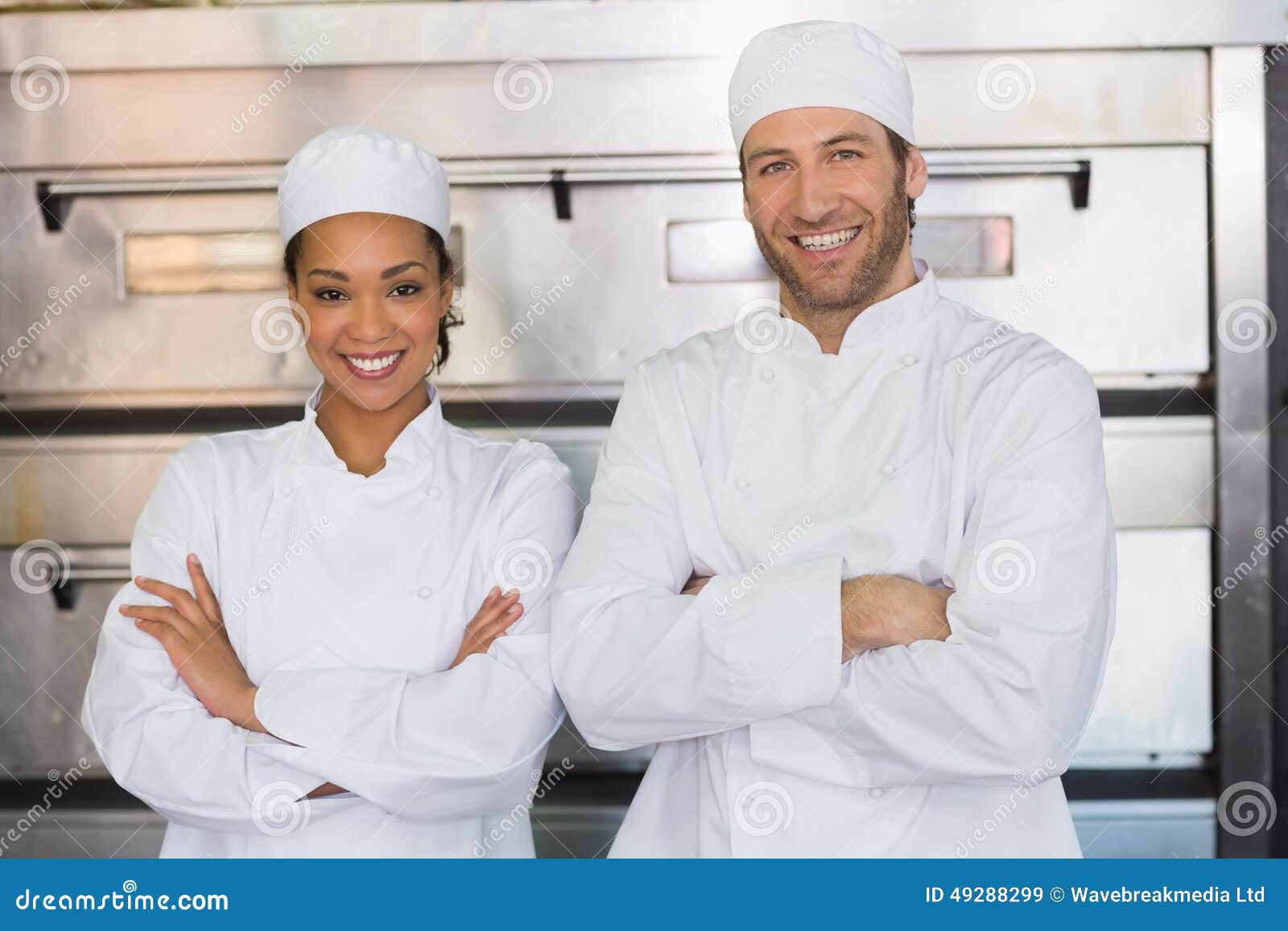 Team of Bakers Smiling at Camera Stock Image - Image of baker, building ...