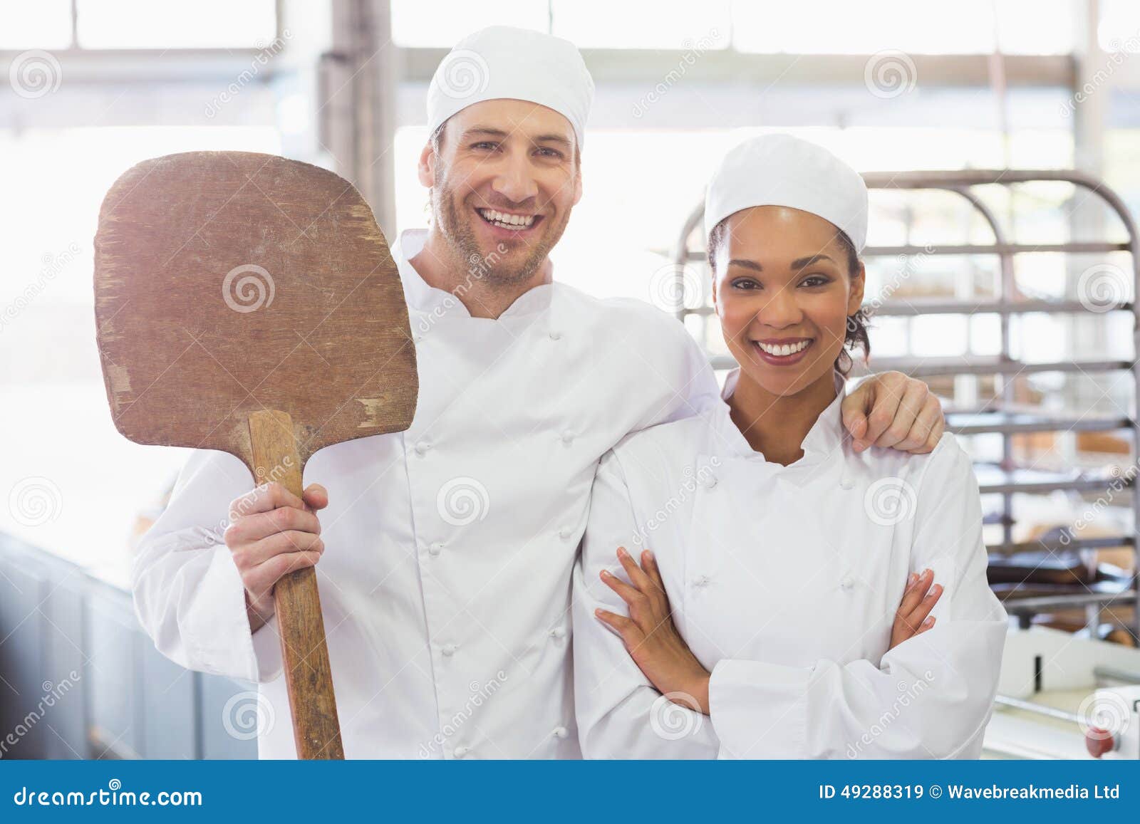 Team of Bakers Smiling at Camera Stock Image - Image of female ...