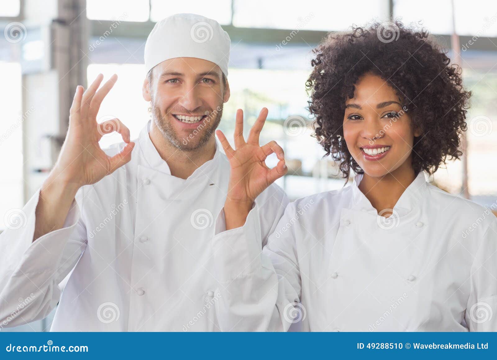 Team of Bakers Smiling at Camera Stock Photo - Image of mixedrace ...