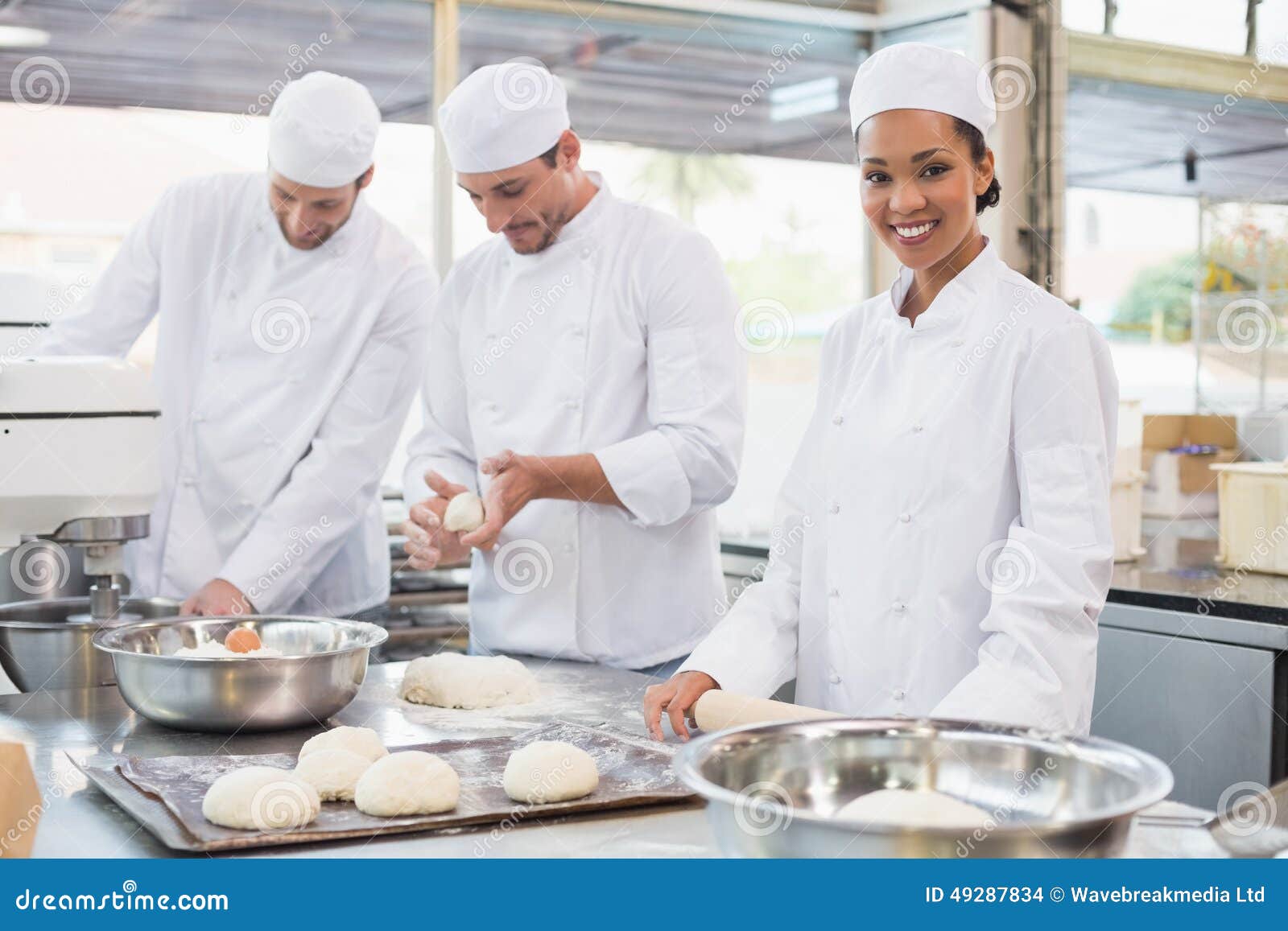 Team of Bakers Working at Counter Stock Photo - Image of bakery, chefs ...