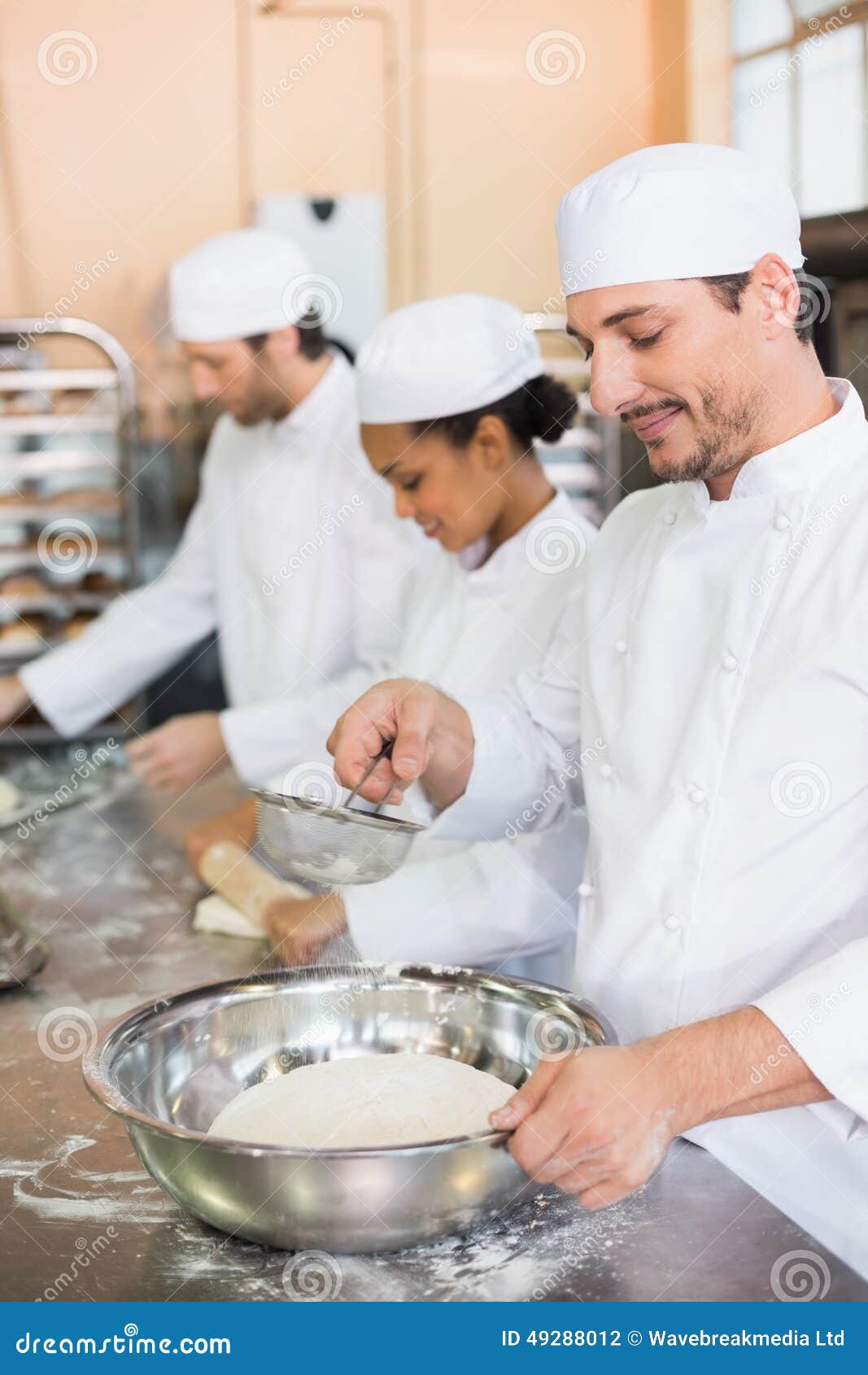 Team of Bakers Working at Counter Stock Photo - Image of coworkers ...