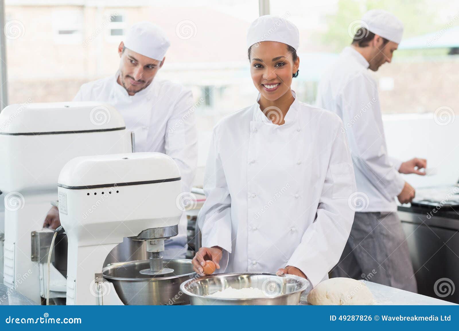 Team of Bakers Working at Counter Together Stock Photo - Image of food ...