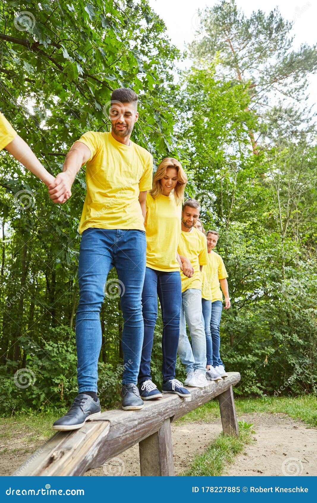 Team Balances Together Over a Beam Stock Image - Image of festival ...