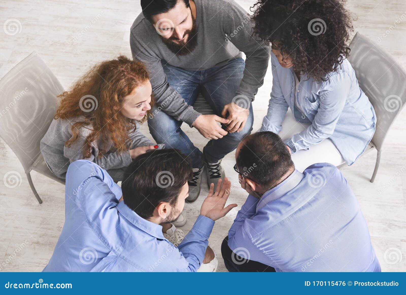 Diverse Young People Sitting in Circle Discussing Working Plan, Top ...
