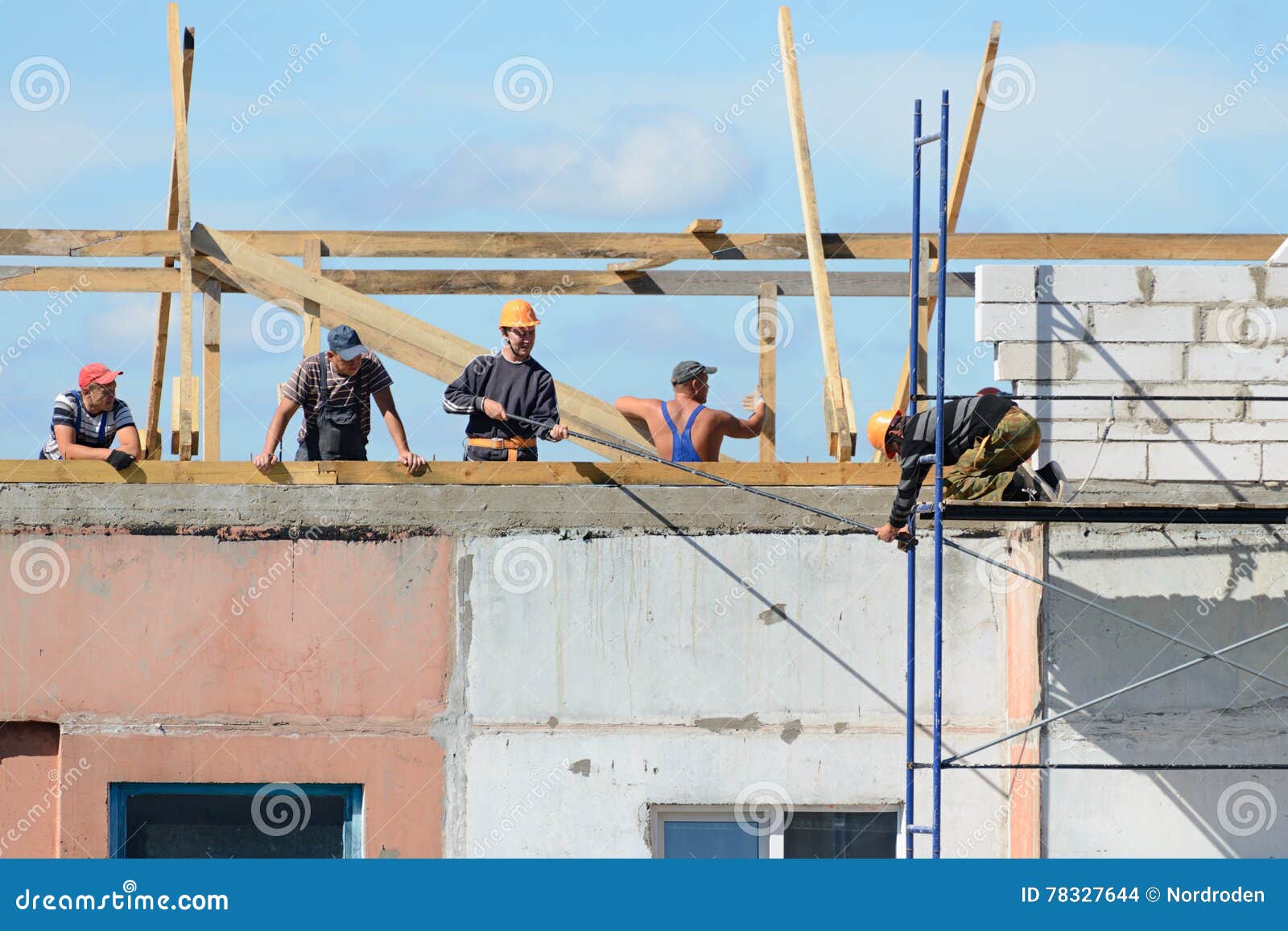 Team of Builders Assembles Scaffolding for Construction Work Editorial ...