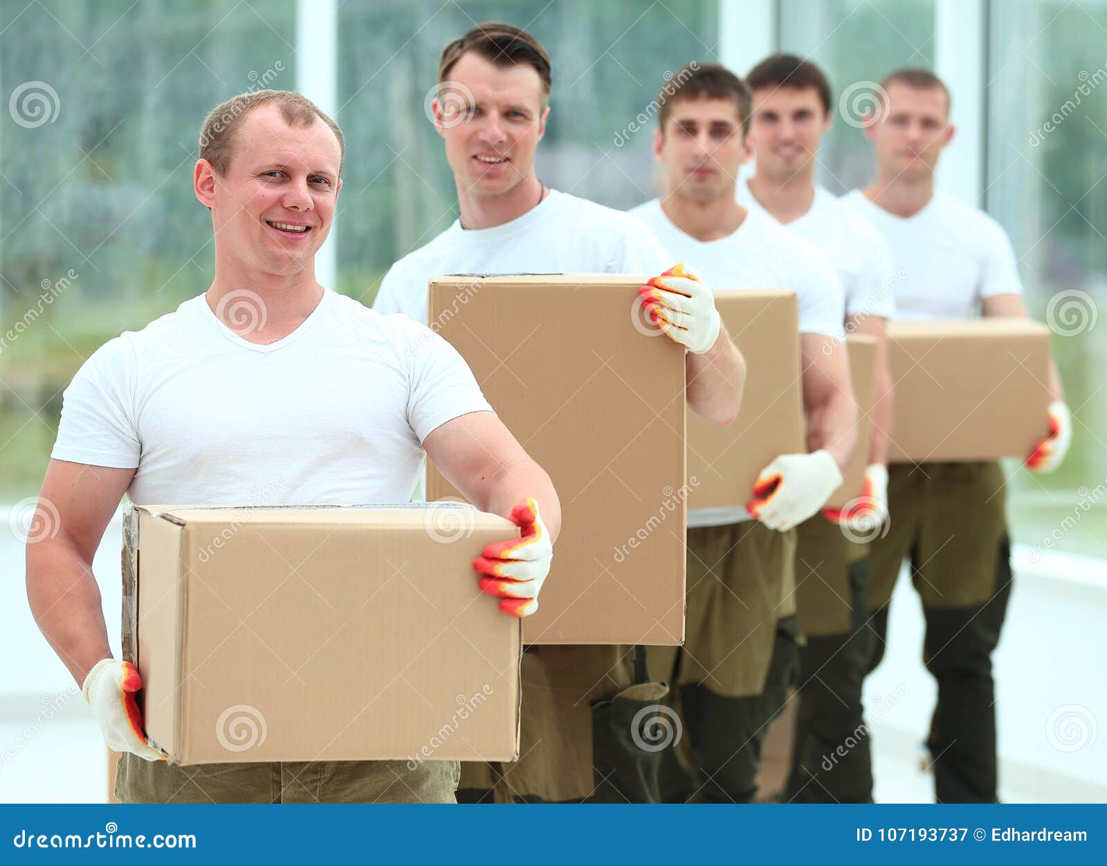 Team of Builders with Boxes of Building Materials Stock Image - Image ...