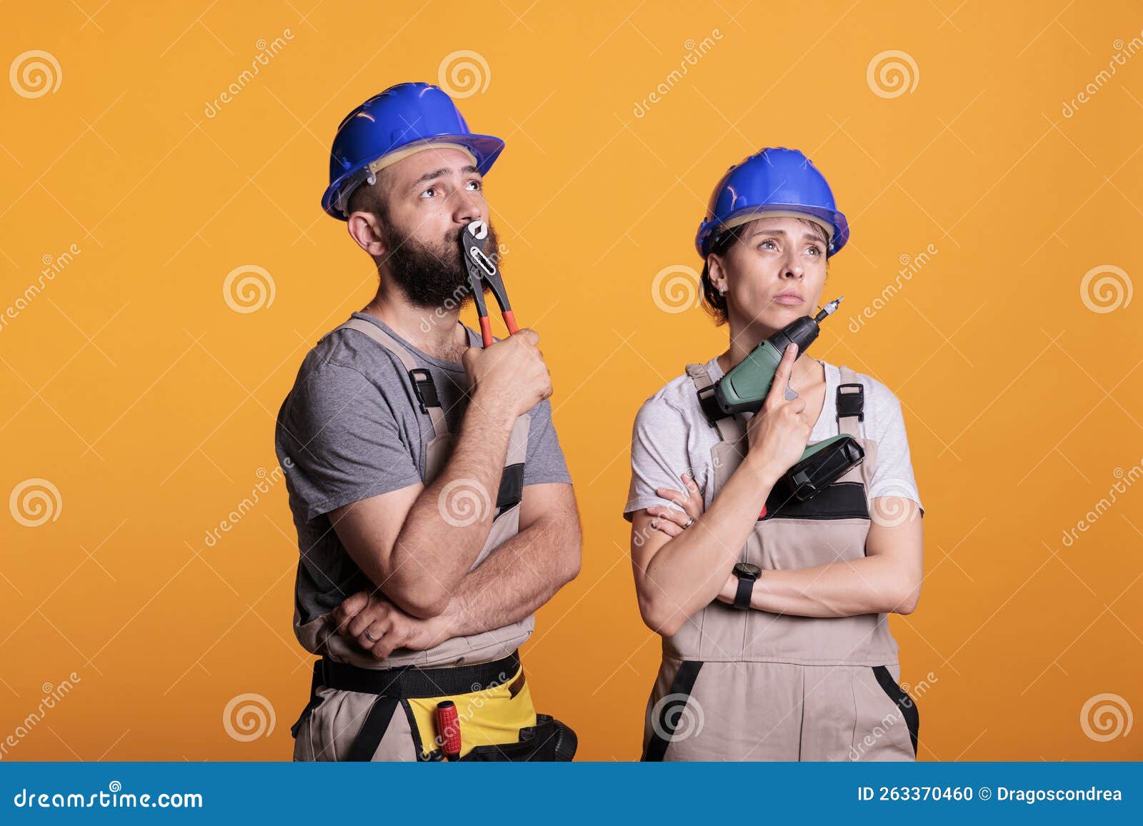 Team of Builders Brainstorming Construction Ideas Stock Photo - Image ...