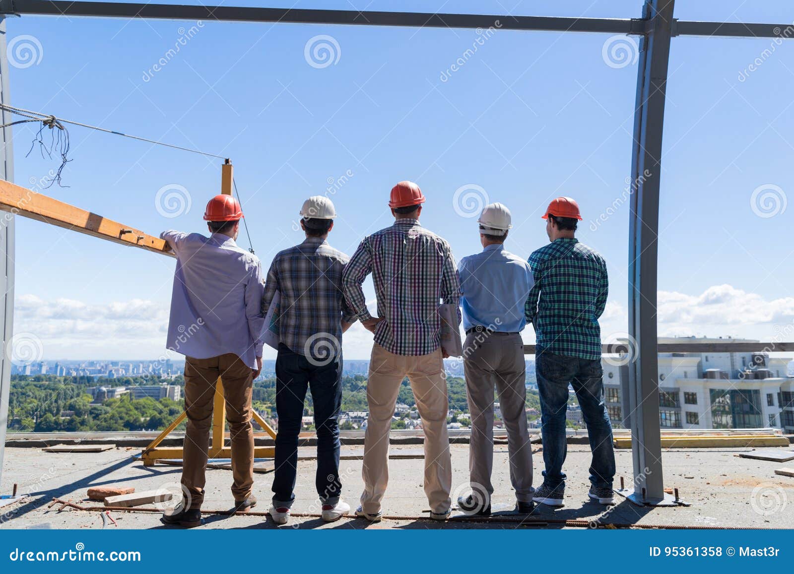 Team of Builders on Costruction Site Back Rear View, Foreman Group in ...