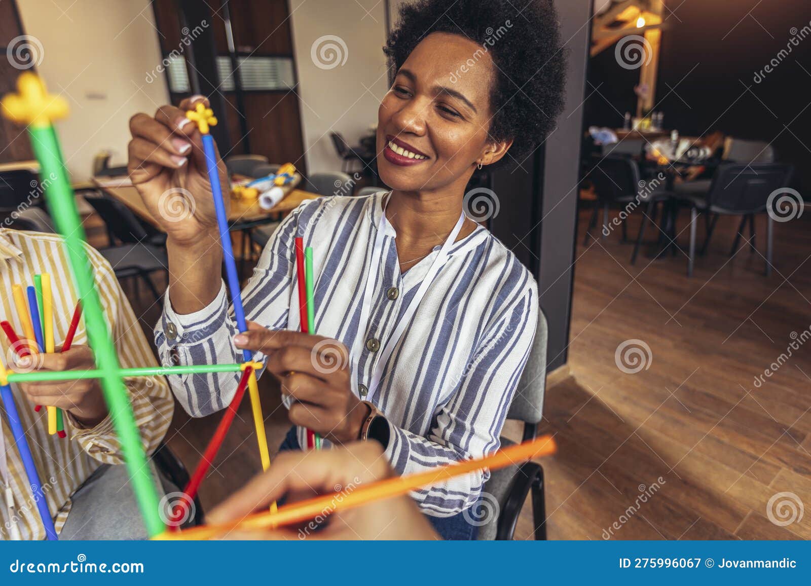 Team Building Activities in the Office with Sticks. Stock Image - Image ...