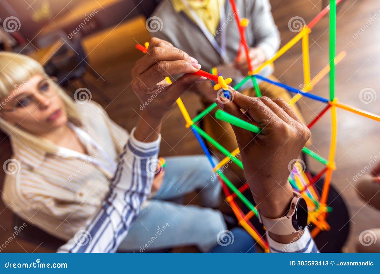 Team Building Activities in the Office with Sticks. Stock Image - Image ...