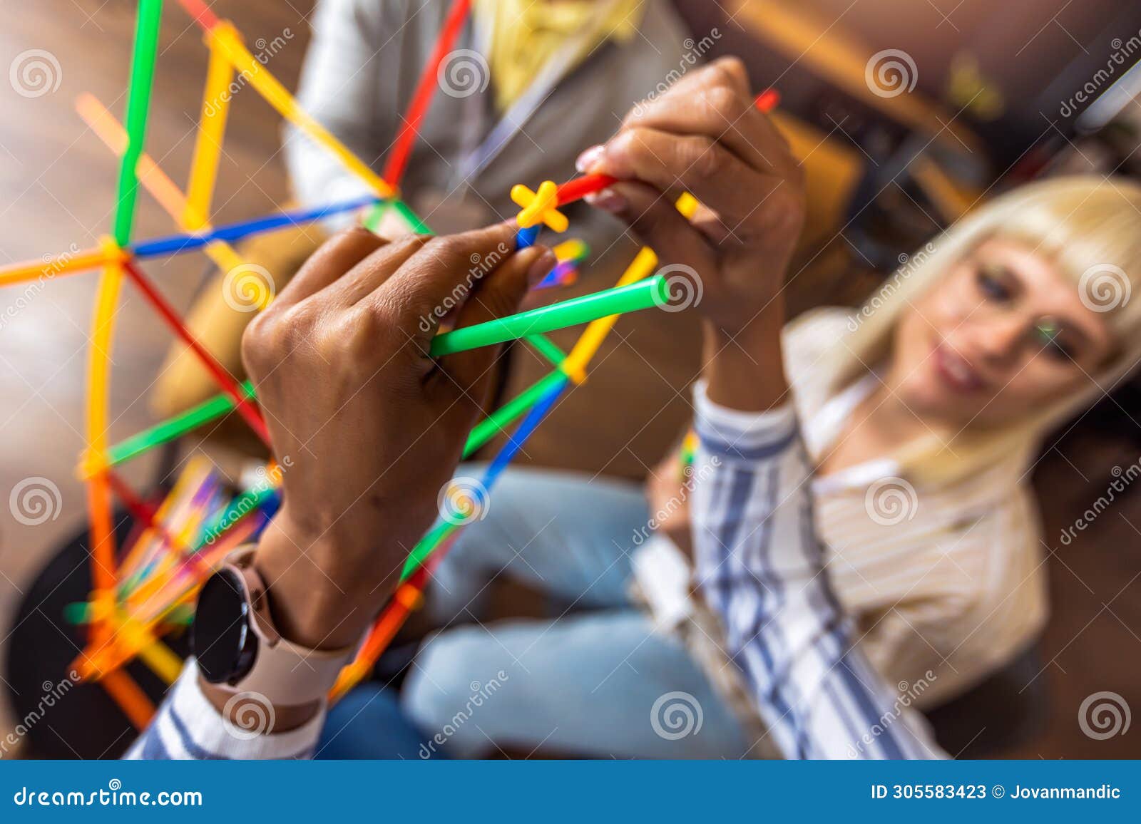 Team Building Activities in the Office with Sticks. Stock Image - Image ...
