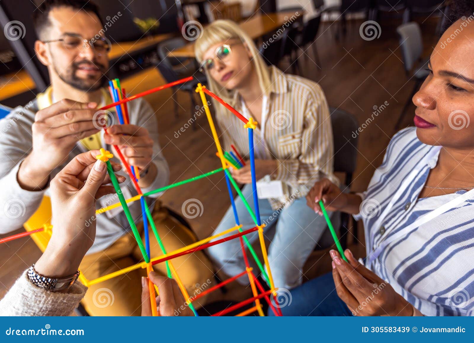 Team Building Activities in the Office with Sticks. Stock Image - Image ...
