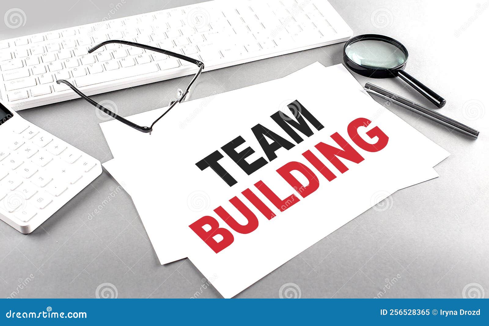 TEAM BUILDING Text on Paper with Keyboard, Calculator on Grey ...