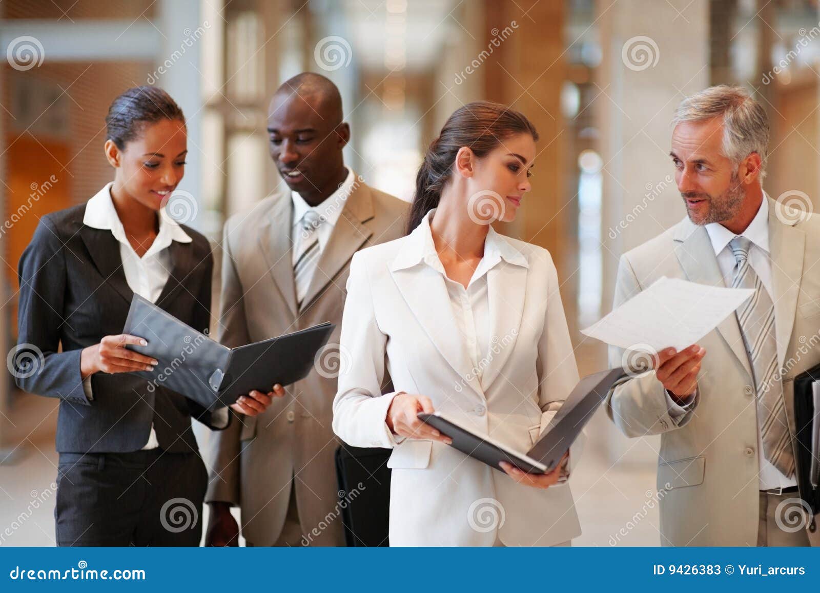 Team of Business Colleagues Having a Conversation Stock Image - Image ...