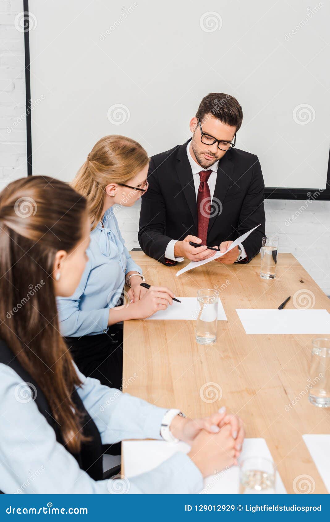 Team of Business People Discussing Documents Stock Image - Image of ...
