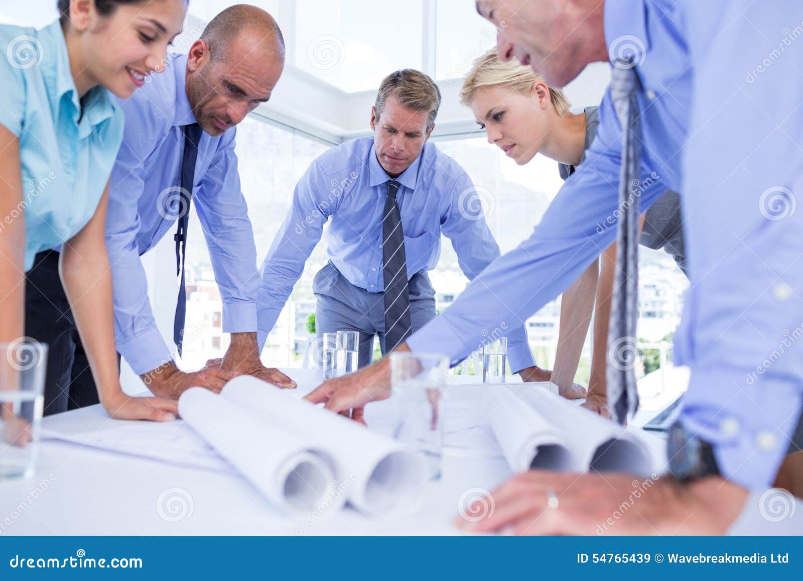 Team of Business People Looking at Construction Plan Stock Image ...
