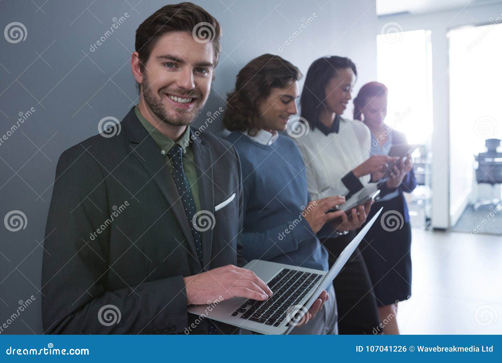 Team of Business People Using Electronic Devices Stock Photo - Image of ...