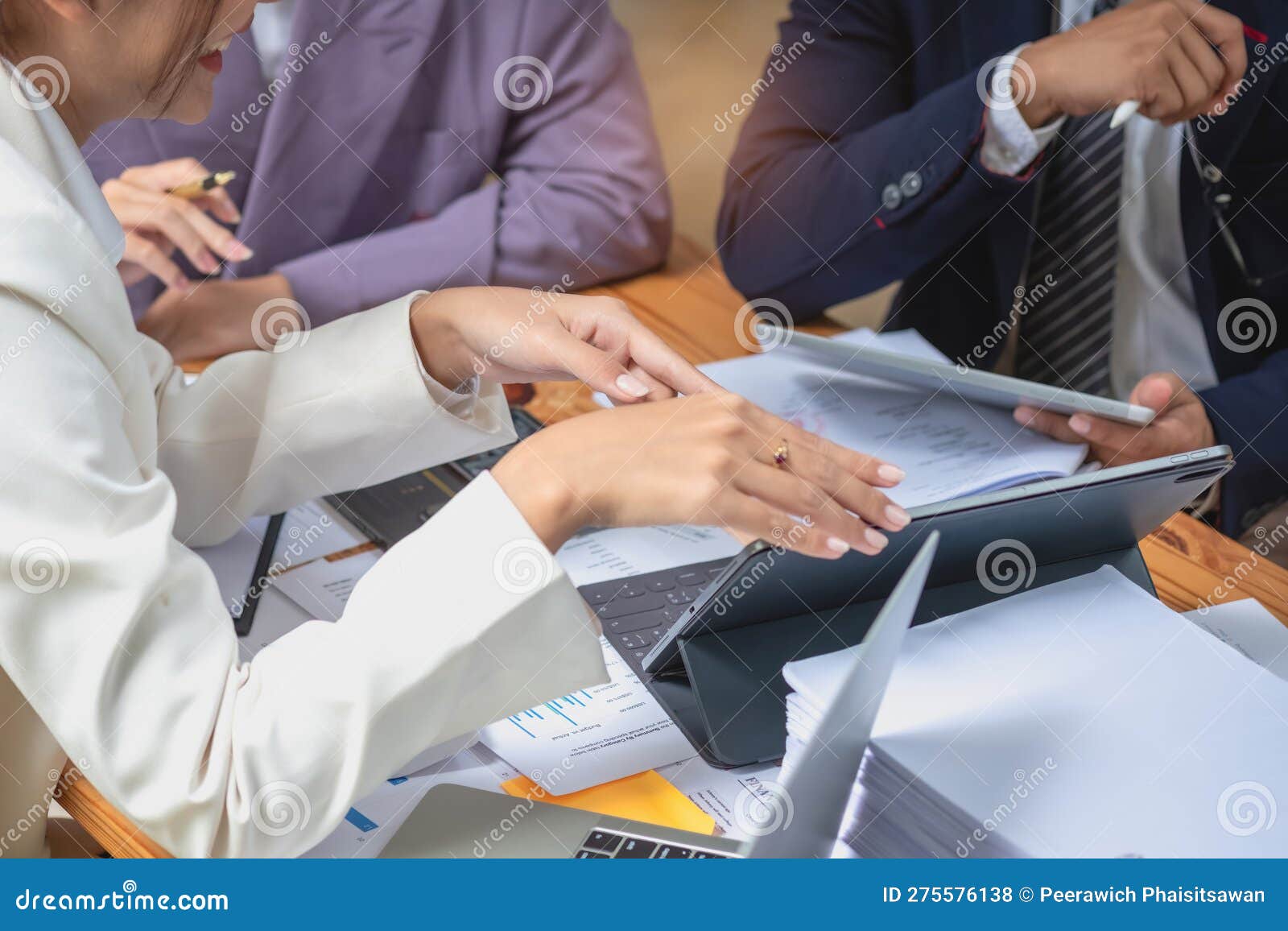 Team Business Three Smiling and Happy Asian Men and Women Team Using ...