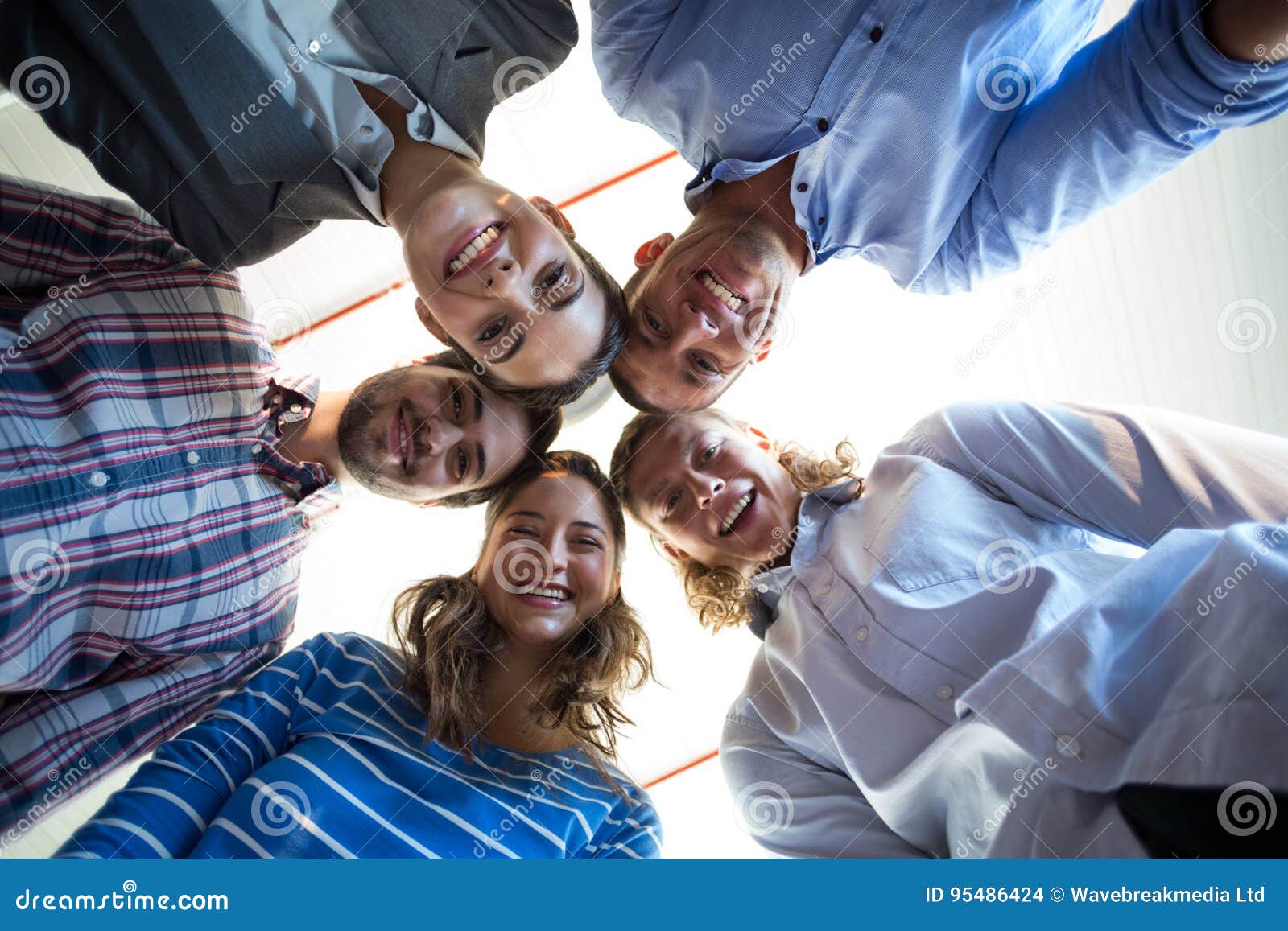 Team of Businesspeople Forming Huddle Stock Photo - Image of coworker ...