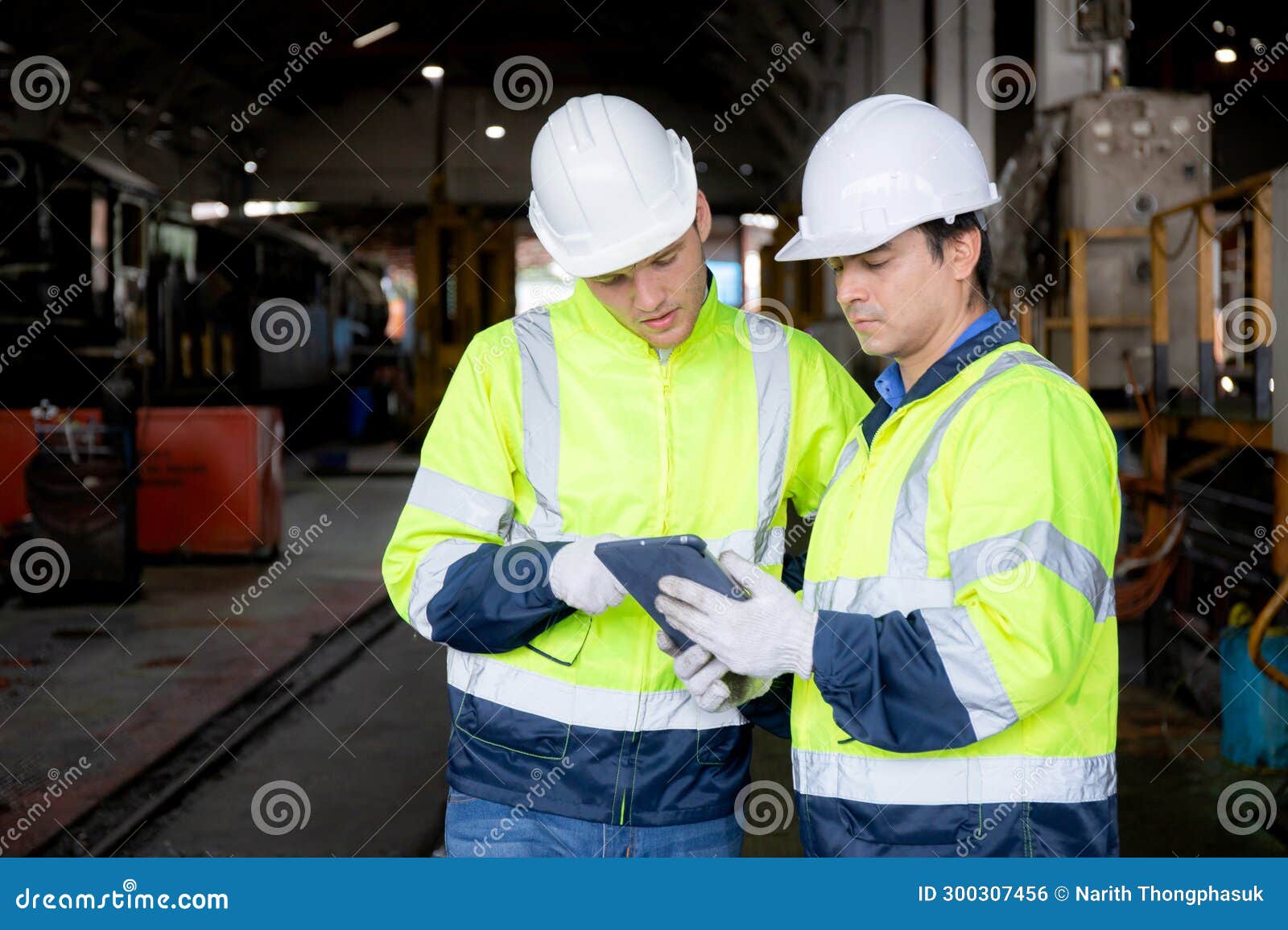 Team Caucasian Engineer Checking Train Looking Tablet in Station, Team ...