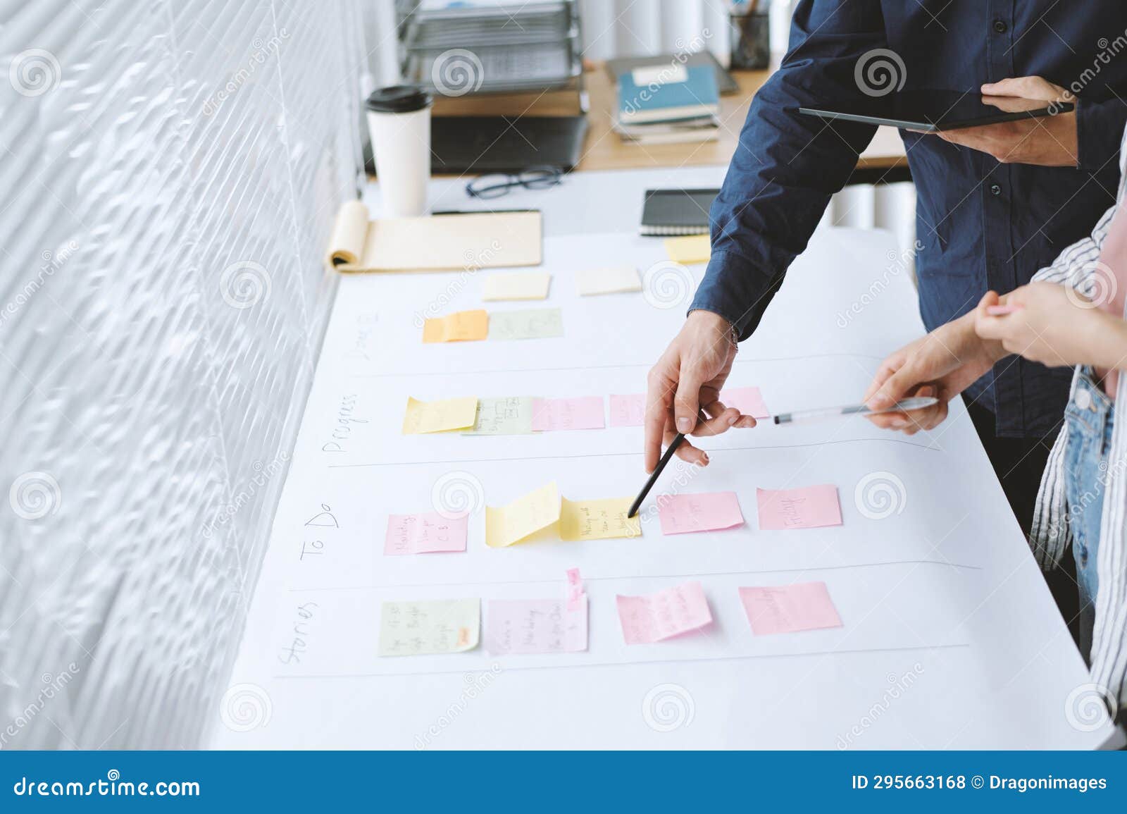 Team Checking Project Roadmap Stock Photo - Image of teamwork, coworker ...