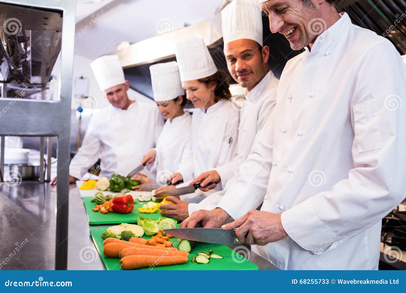 Team of Chefs Chopping Vegetables Stock Image - Image of cheerful ...