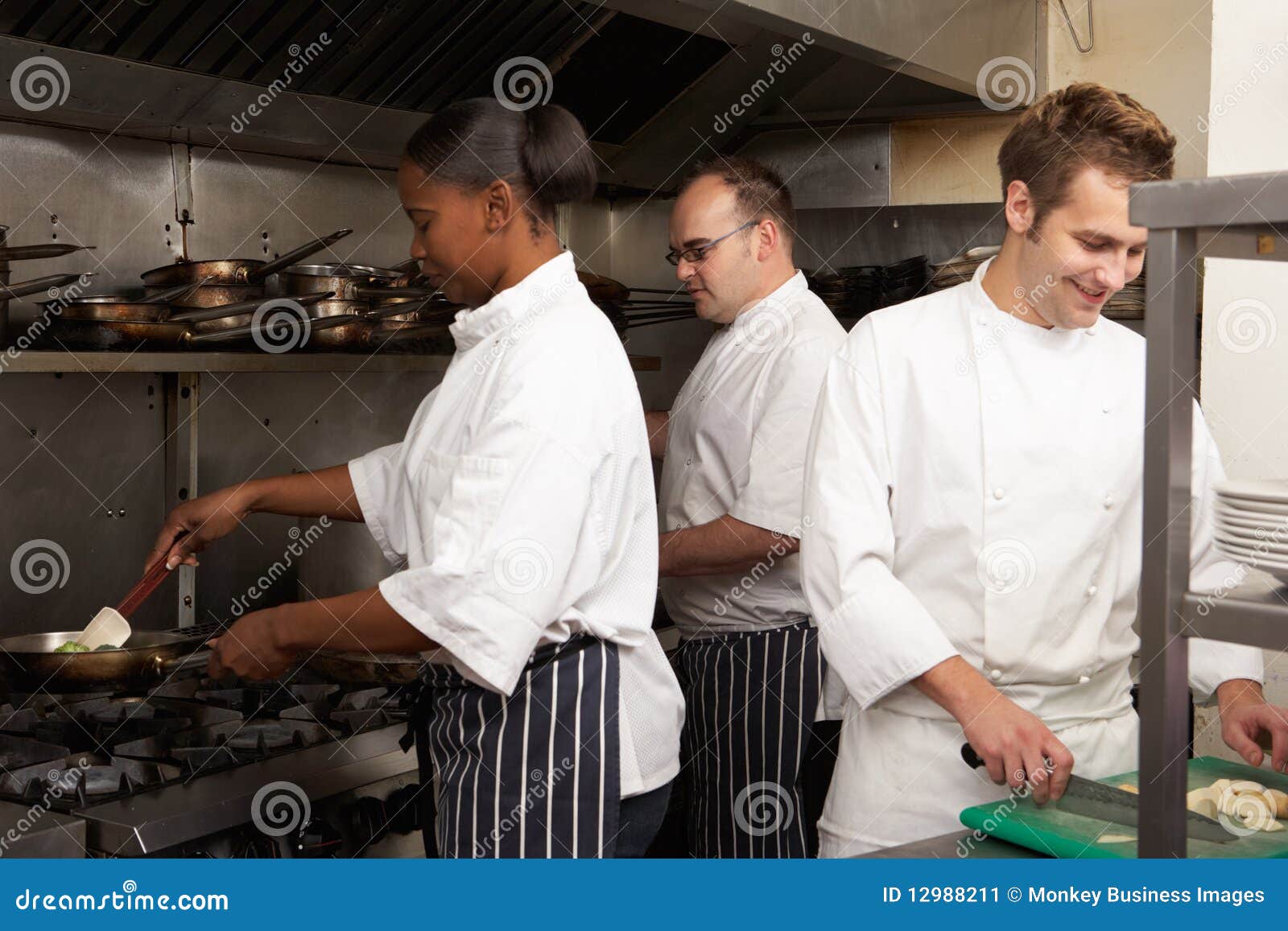 Team of Chefs Preparing Food Stock Image - Image of trainee, whites ...