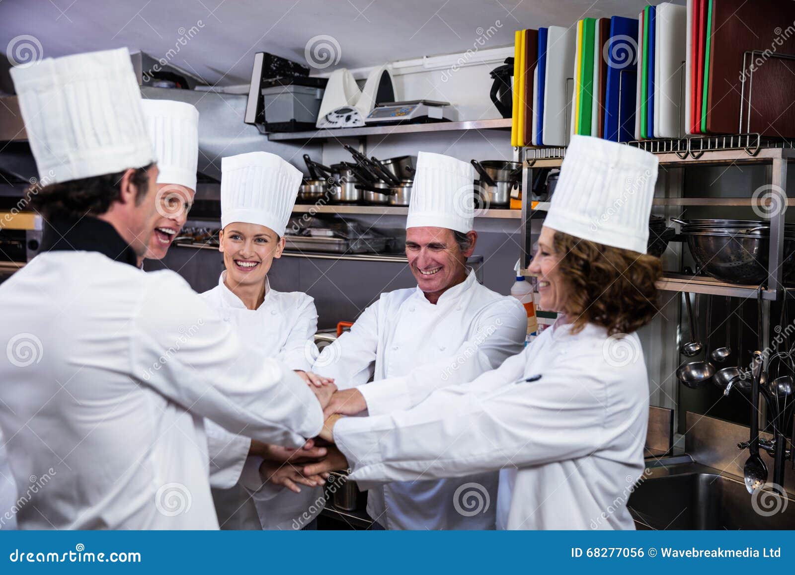 Team of Chefs Putting Hands Together and Cheering Stock Photo - Image ...