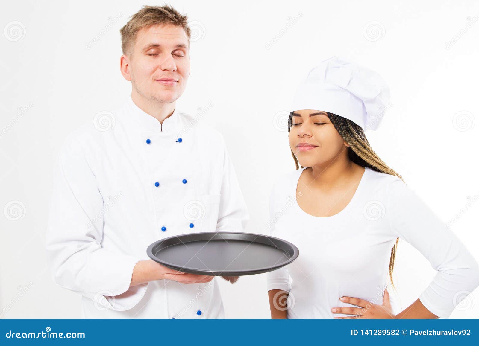 A Team of Chefs Sniffs the Pleasant Aroma of Something on an Empty Tray ...