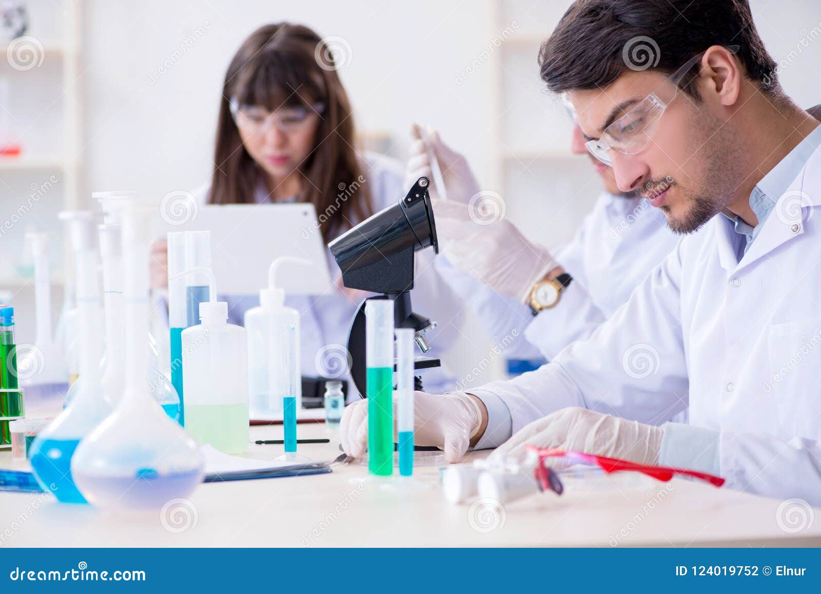 The Team of Chemists Working in the Lab Stock Photo - Image of ...