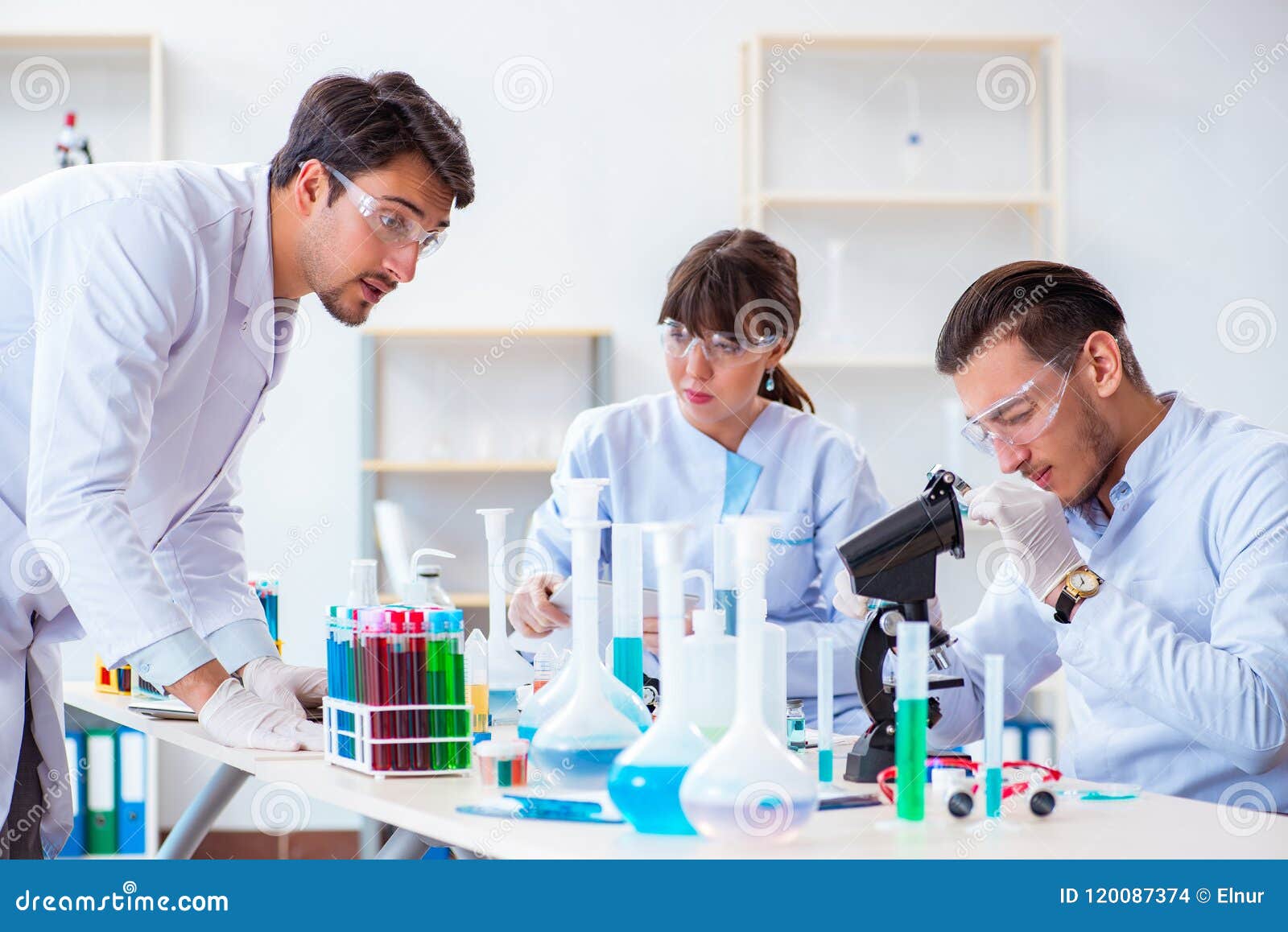 The Team of Chemists Working in the Lab Stock Photo - Image of glass ...