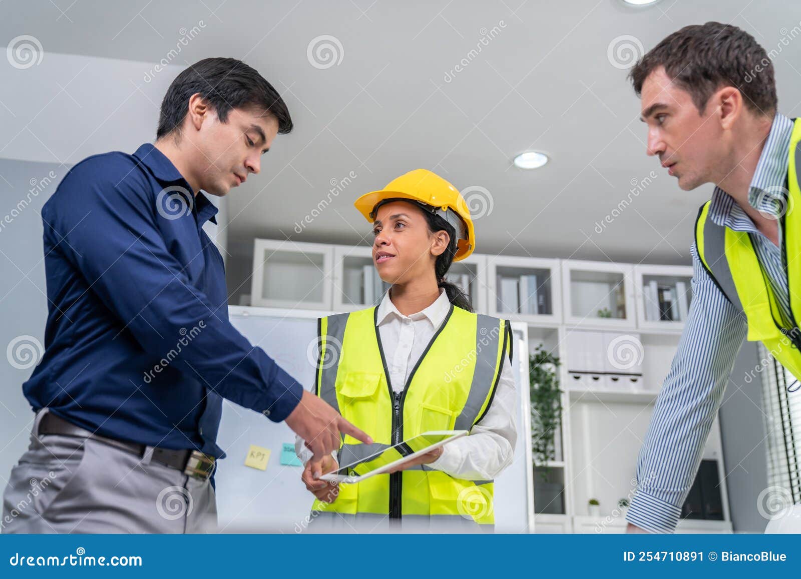 A Team of Competent Engineers Discussing with the Investor in the ...