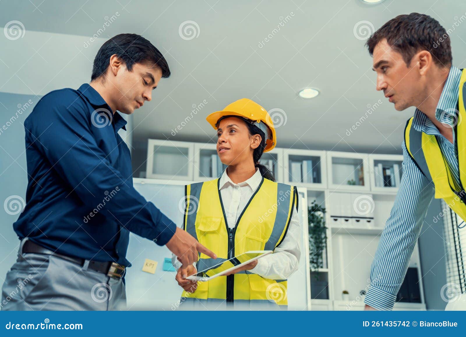 A Team of Competent Engineers Discussing with the Investor in the ...