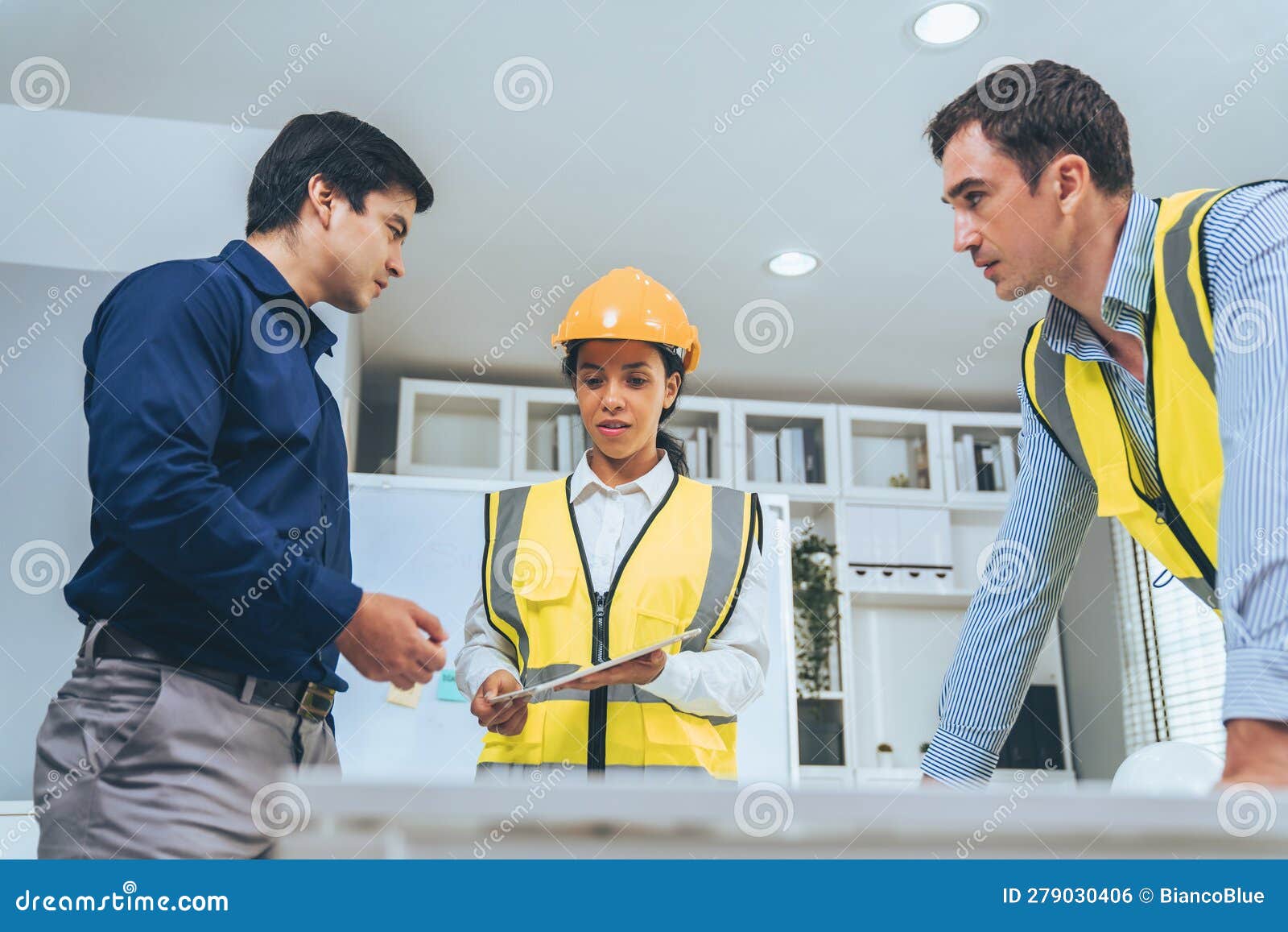 A Team of Competent Engineers Discussing with the Investor in the ...