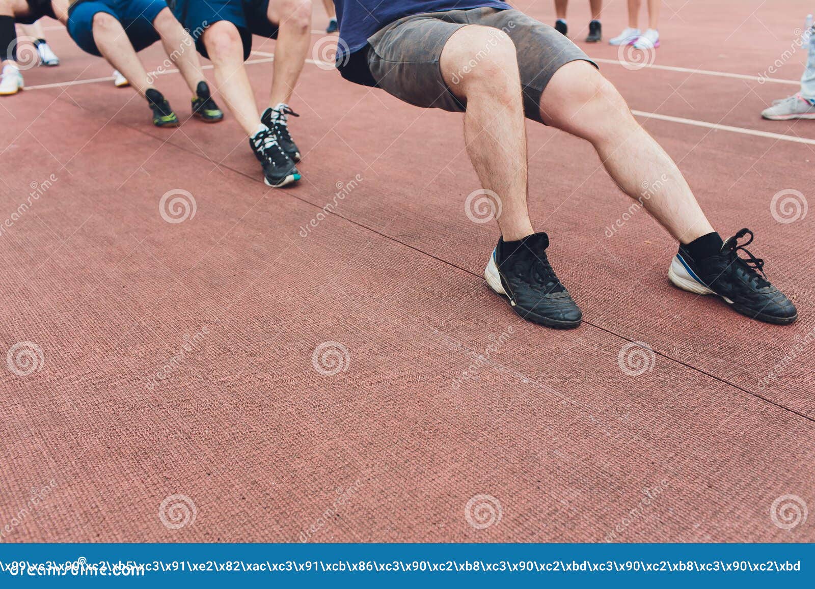 Team Competing in Tug of War Men Pull the Rope. Stock Photo - Image of ...