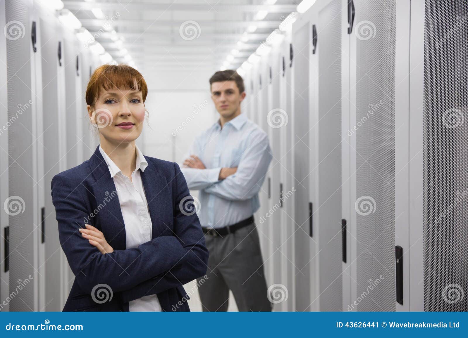 Team of Computer Technicians Looking at Camera Stock Image - Image of ...
