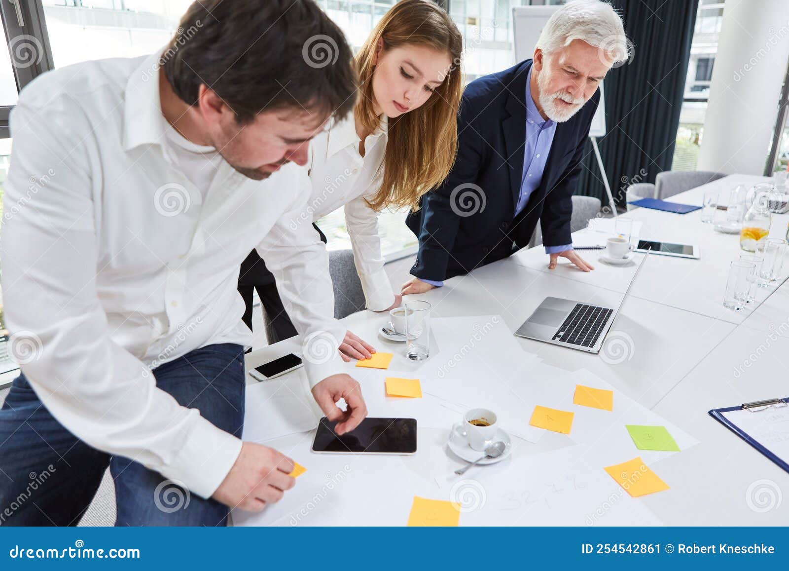 Team at Conference Table Planning Strategy Stock Image - Image of group ...