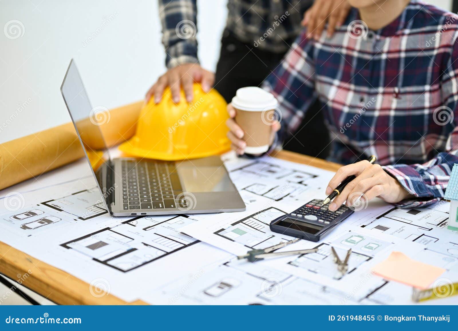 Team of Construction Engineer Working Together in the Office ...