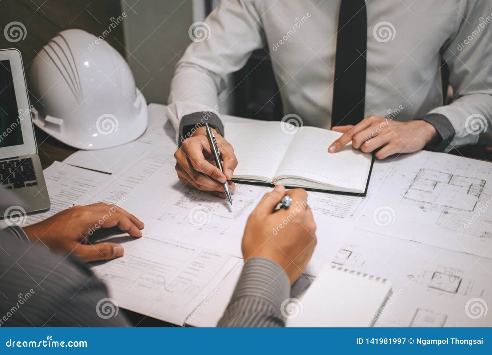 Team of Construction Engineering or Architect Partner Discuss a ...