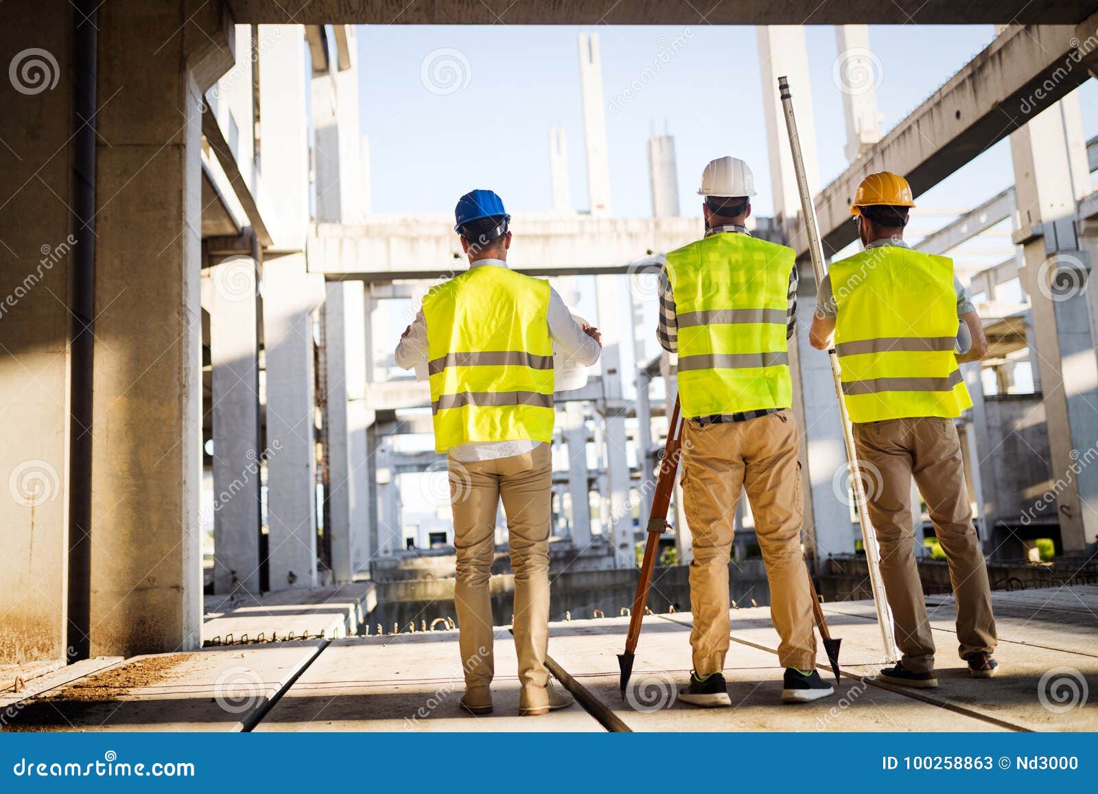 Team of Construction Engineers Working on Building Site Stock Image ...