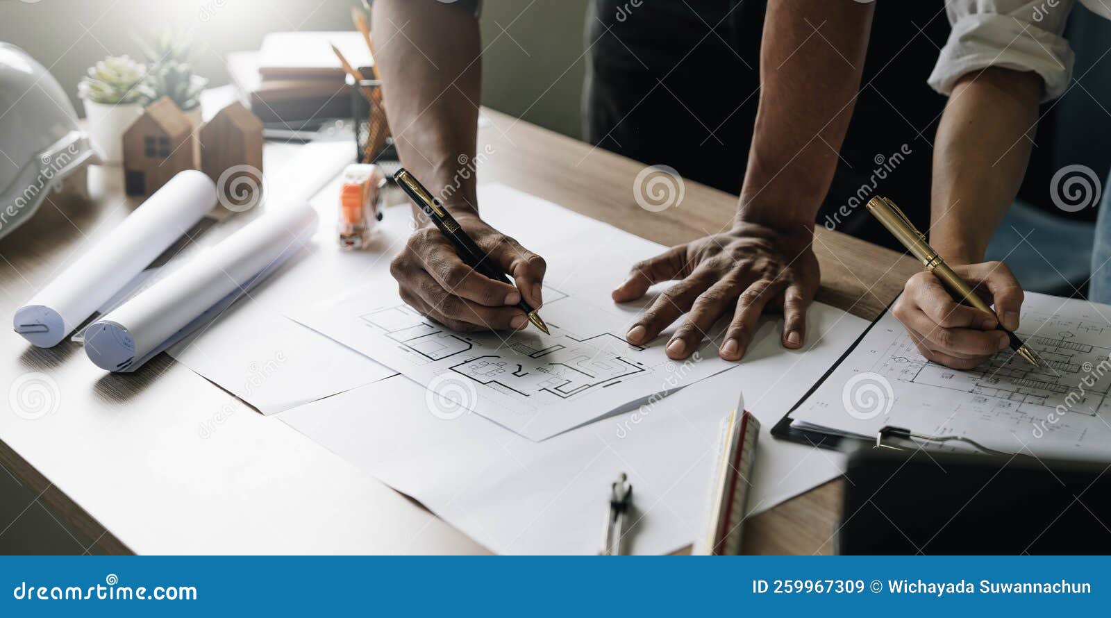 Team Construction Engineers Working at Construction Site with Blueprint ... Team Construction Engineers Working at Construction Site with Blueprint ...